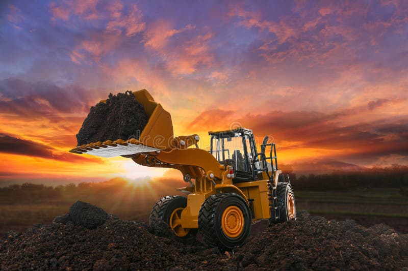 Wheel Loader are Digging the Soil in the Construction Site. Stock Photo ...