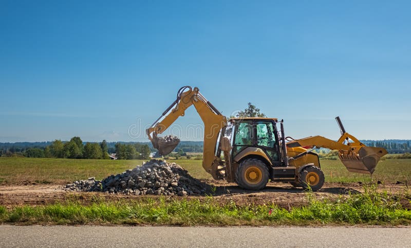 Wheel Loader Excavator with Field Background during Earthmoving Work ...