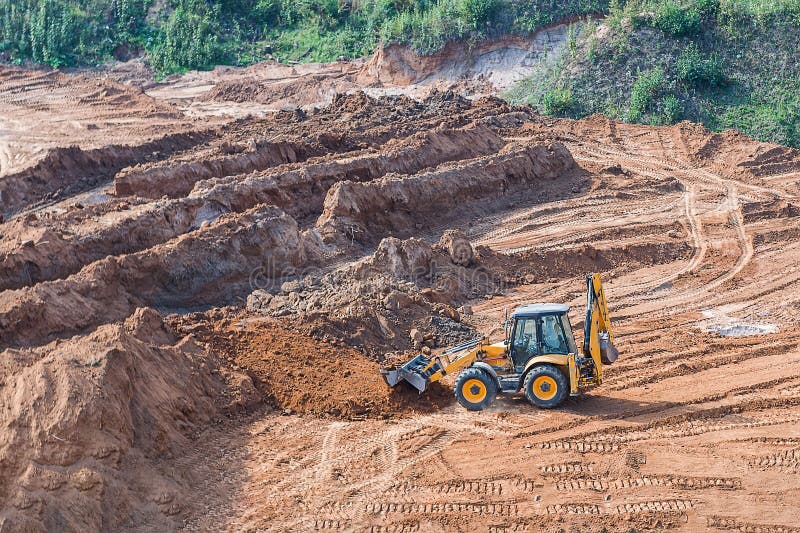 Wheel Loader Excavator Machine Working in Construction Site. Wheel ...