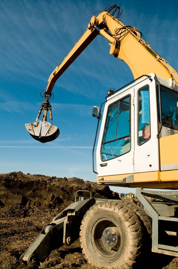 Wheel Loader Excavator at Work Stock Photo - Image of bucket, site ...
