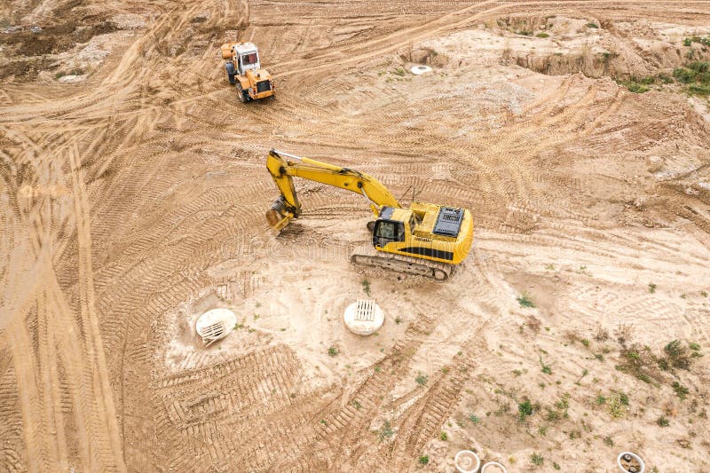 Wheel Loader and Excavators Work on Construction of the Foundation Zero ...