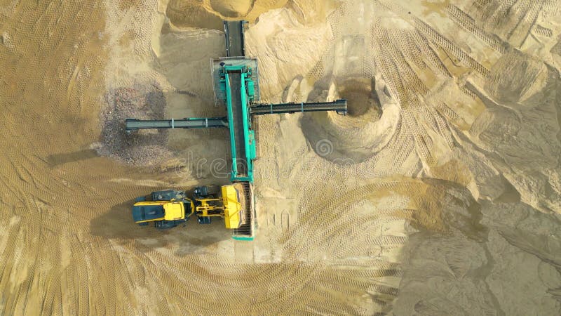 Wheel Loader Load Sand in Dump Truck in Open Pit. Heavy Machinery on ...
