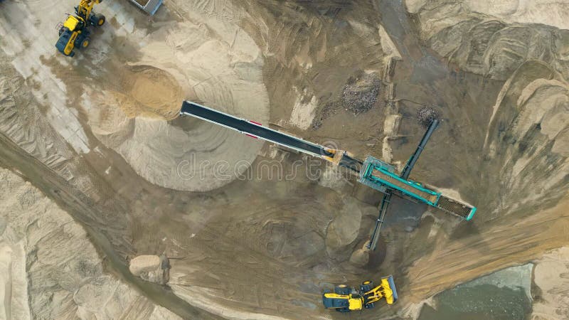 Wheel Loader Load Sand in Dump Truck in Open Pit. Heavy Machinery on ...