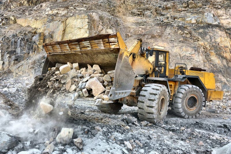 Wheel Loader Machine Unloading Rocks Stock Photo - Image of action ...