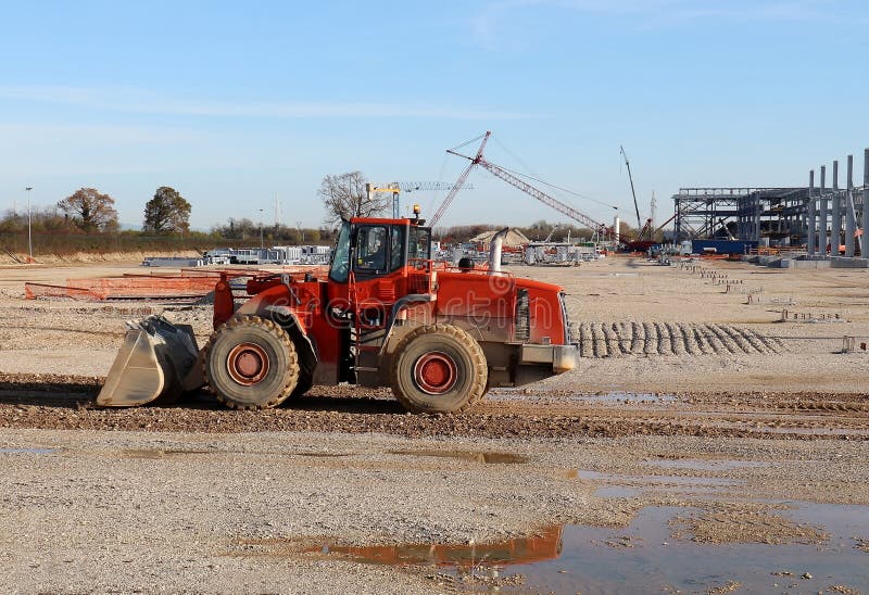 Wheel Loader Machine at Work in a Construction Site of a New Industrial ...