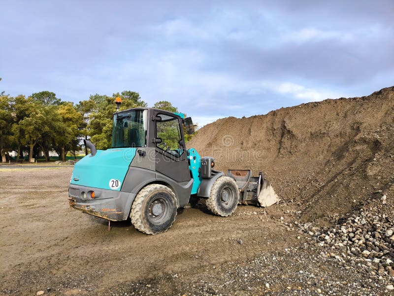 Wheel Loader Next To a Pile of Landfill Ready for Loading Stock Image ...