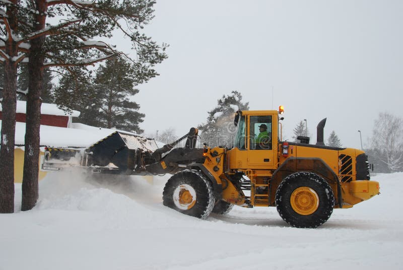 Snowplow sweeps the snow editorial photography. Image of cleanup - 28402262