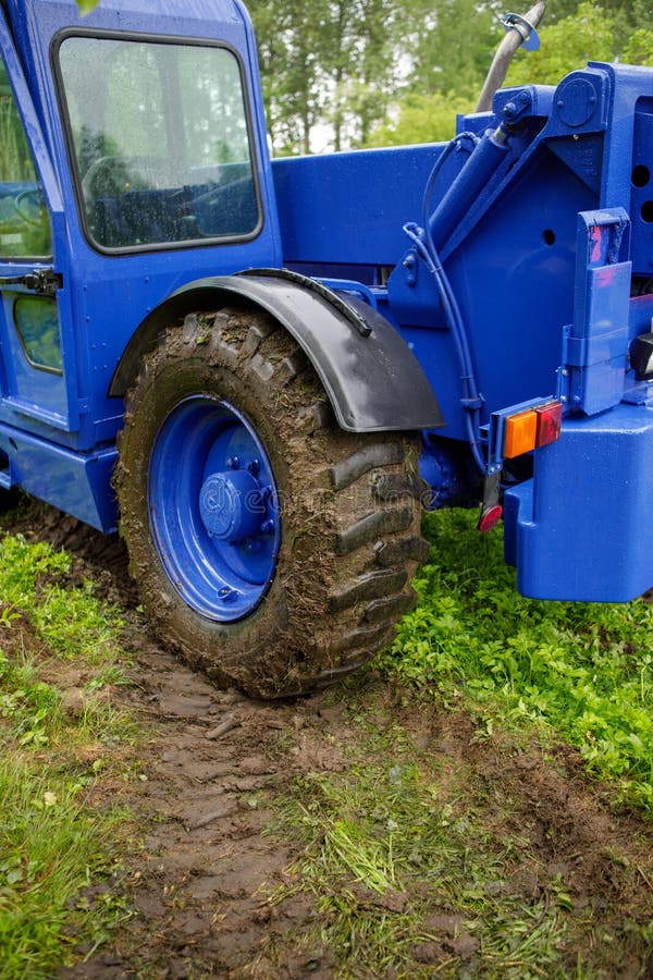 A Wheel Loader of the Technical Relief Organization Drives Over the ...