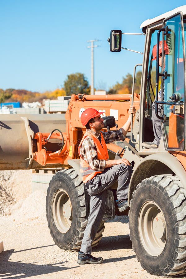 Wheel Loader with Tip-up Bucket on Construction Site Stock Photo ...