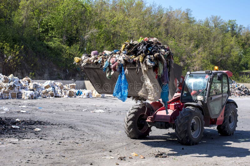 Wheel Loader Transporting Municipal Waste To the Waste Treatment Plant ...