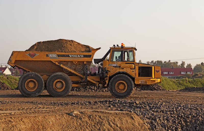 A Wheel Loader Transporting Sand for Construction Editorial Photography ...