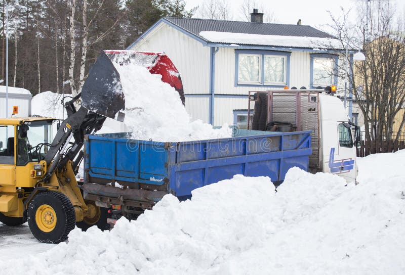 Wheel Loader Unloading Snow Stock Photo - Image of machine, removing ...