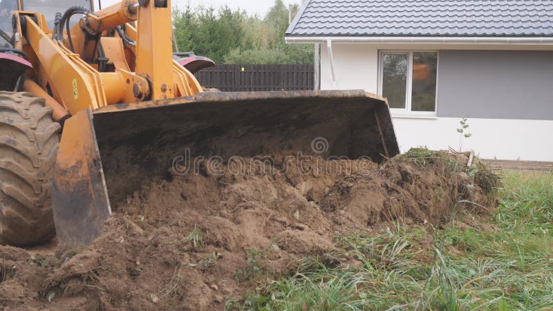 Wheel Loader Working on the Construction of a House Stock Video - Video ...