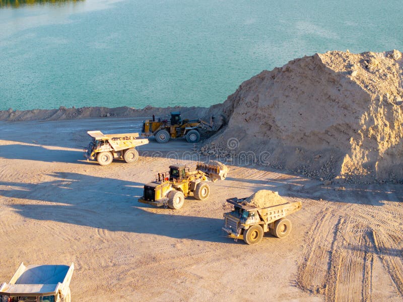 Wheel Loaders Loading Rock into a Dump Truck at a Quarry Stock Image ...
