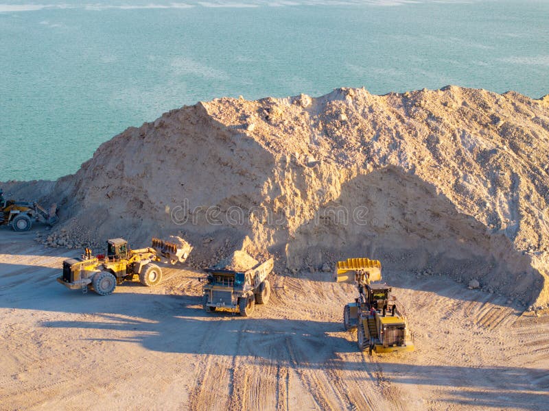 Wheel Loaders Loading Rock into a Dump Truck at a Quarry Stock ...