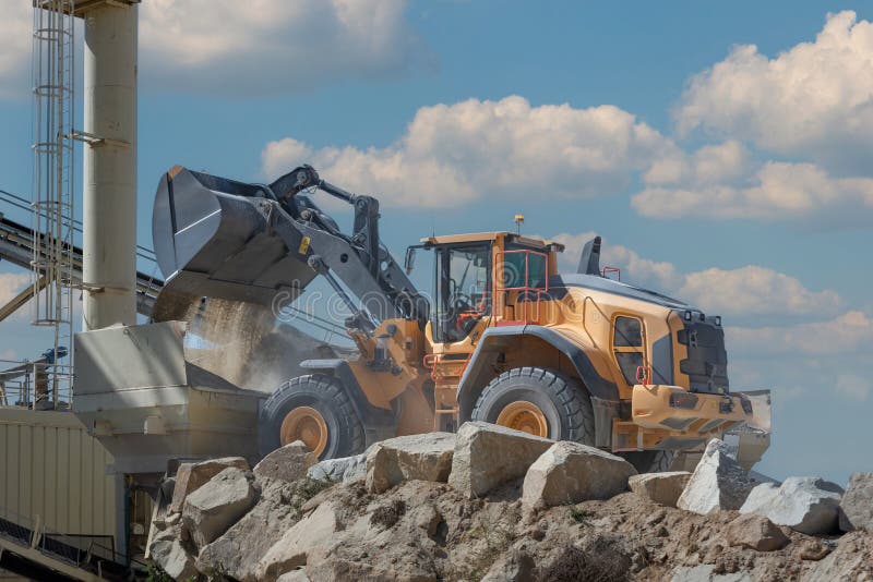 Wheel Loaders Moving Sand in a Quarry Stock Photo - Image of mover ...
