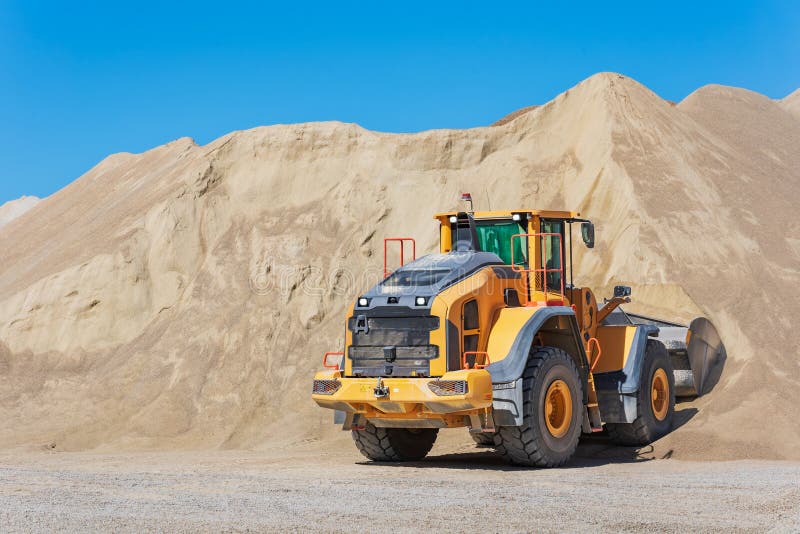 Wheel Loaders Moving Sand in a Quarry Stock Image - Image of warehouse ...