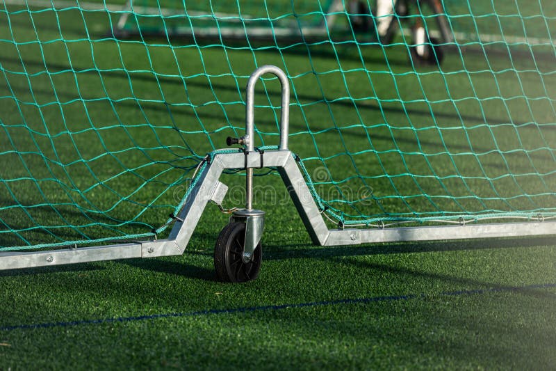 Wheel on a Moveable Football Goal.. Stock Photo - Image of grass, cable ...