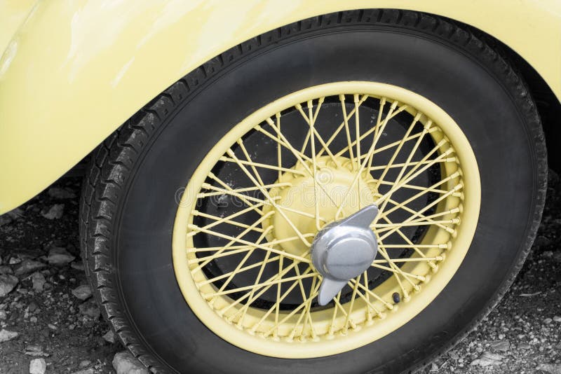 Wheel of a Non-modern CarWheel with Yellow Spokes of a Non-modern Car ...