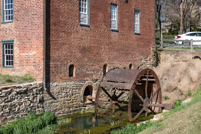 The Wheel of an Old Water Mill. the Rusty Metal of Broken Blades Stock ...