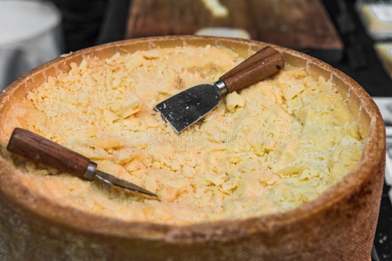 Big Wheel of Parmesan Cheese on Counter of Restaurant Self Service ...