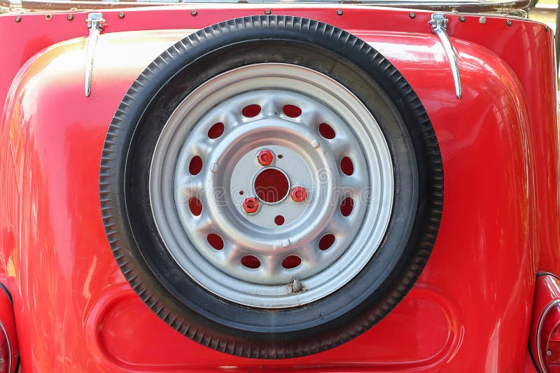The wheel on the red car stock image. Image of wheel - 319073979