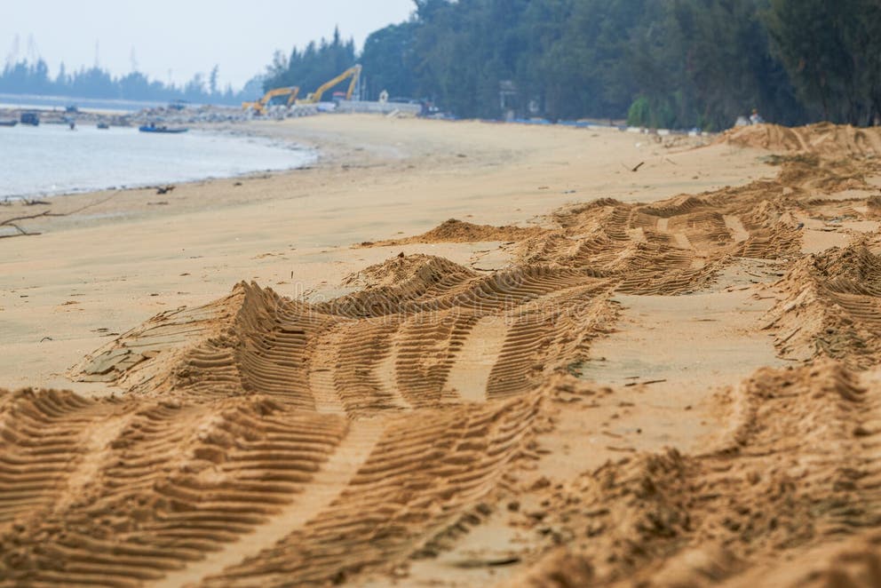 The Wheel Ruts of Construction Vehicles on the Beach at the Seaside ...