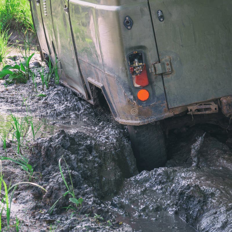 Wheel of an SUV Stuck in Deep Mud on an Impassable Country Road Stock ...
