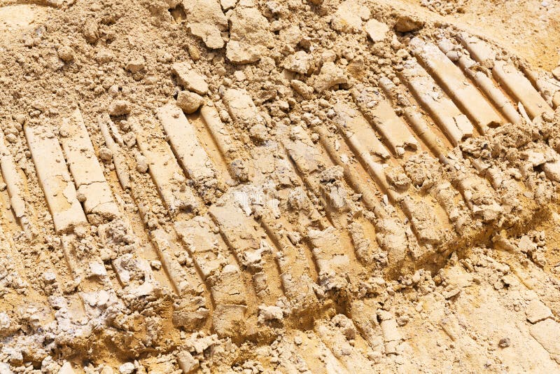 Wheel track on the ground stock photo. Image of track - 242779434