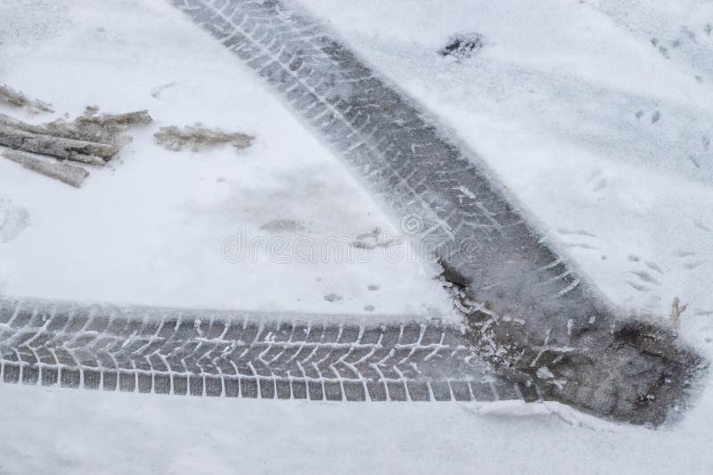 Wheel Track on Fresh Snow. Wheel Tracks on the Road Covered with Snow ...