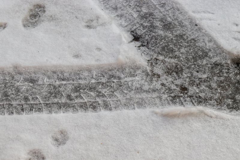 Wheel Track on Fresh Snow. Wheel Tracks on the Road Covered with Snow ...