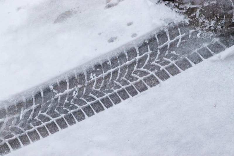 Wheel Track on Fresh Snow. Wheel Tracks on the Road Covered with Snow ...