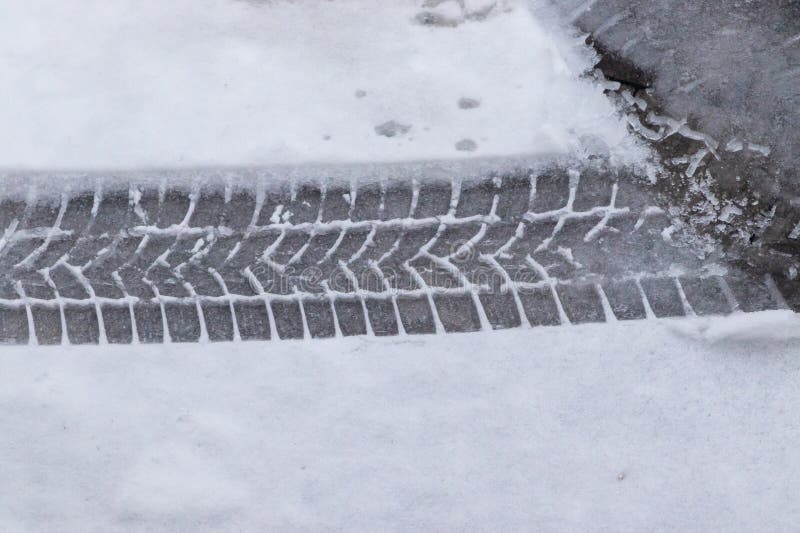 Wheel Track on Fresh Snow. Wheel Tracks on the Road Covered with Snow ...