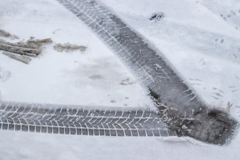 Wheel Track on Fresh Snow. Wheel Tracks on the Road Covered with Snow ...