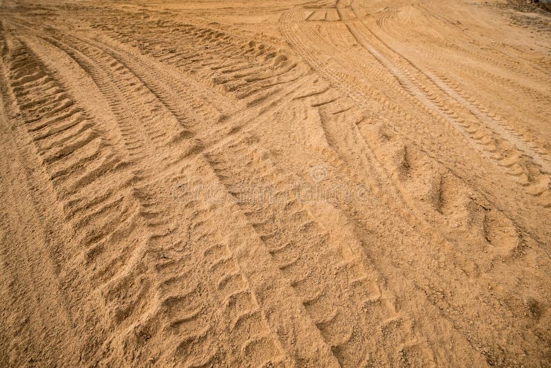Wheel track on the sand stock photo. Image of texture - 84997294