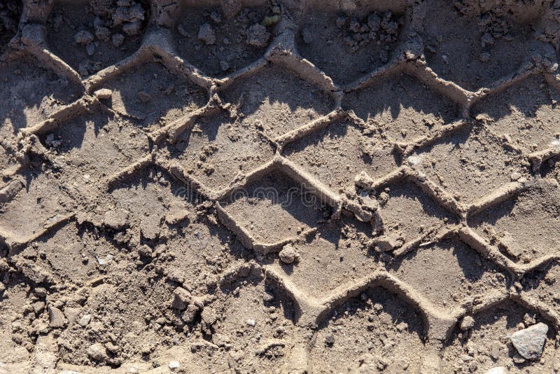 Wheel tracks on the ground stock image. Image of sand - 40347001