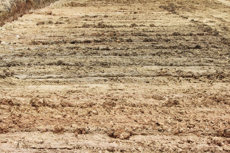 Wheel Tracks in the Mud, Detail Footprints Bulldozer in the ...