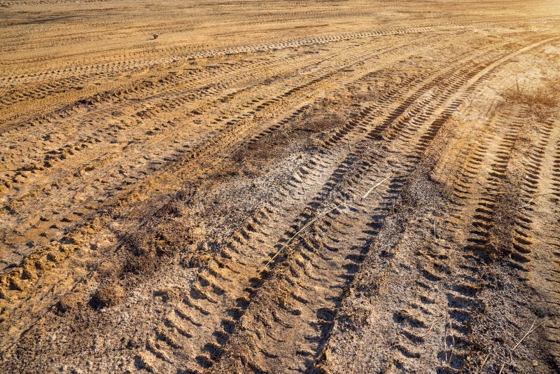 Wheel tracks on the soil, stock photo. Image of wheel - 220816842
