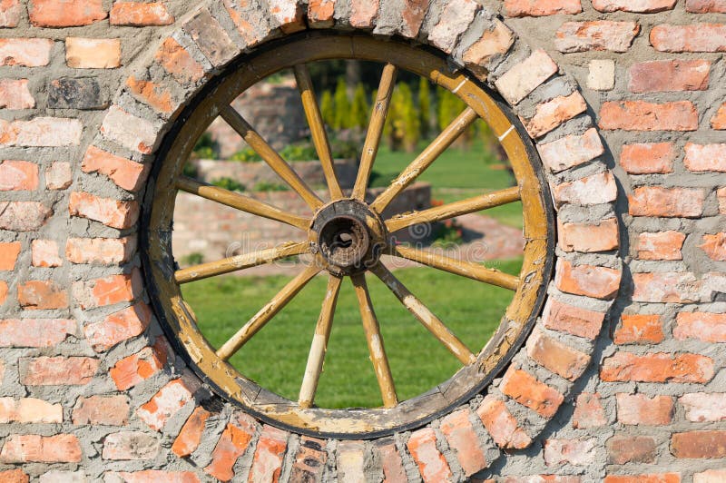 Wheel in wall stock photo. Image of wall, wooden, stone - 45240692