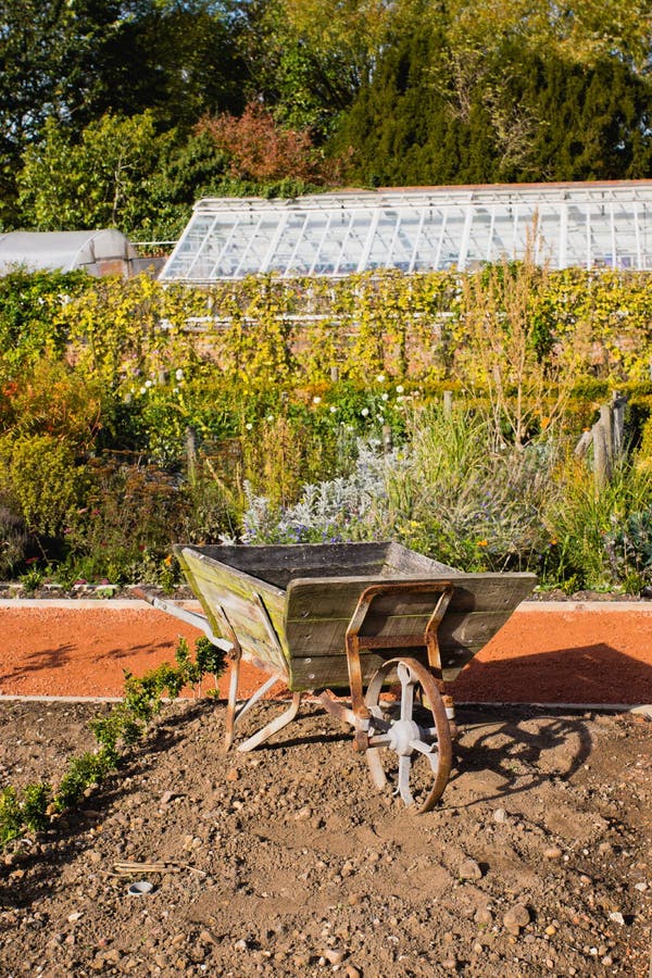 Wheelbarrow stock photo. Image of fence, houses, ecology - 21737156