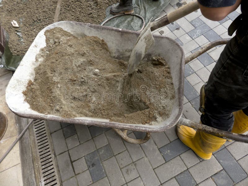 Wheelbarrow with cement stock image. Image of civil, mortar - 31977885