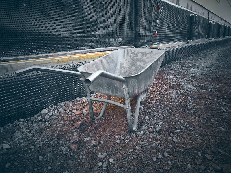 Wheelbarrow at Construction Site Stock Image - Image of dirty ...