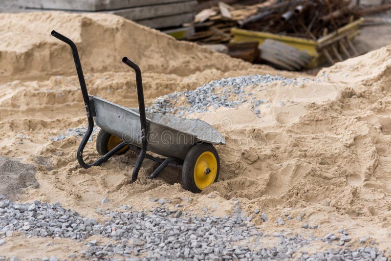 Wheelbarrow on the Construction Site Stock Image - Image of brown, dirt ...