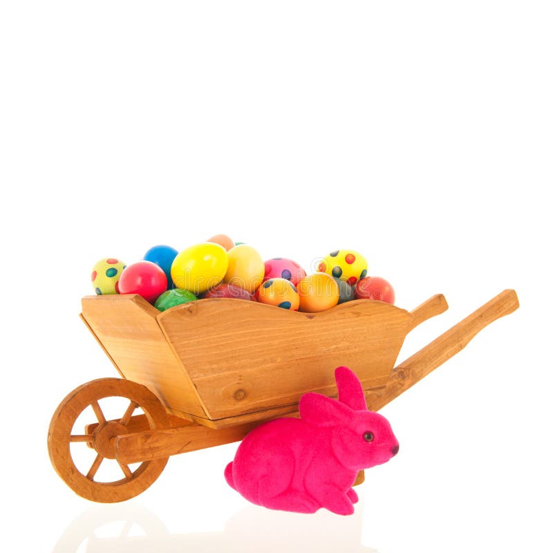 Wheelbarrow easter eggs stock photo. Image of eggs, wooden - 137196448