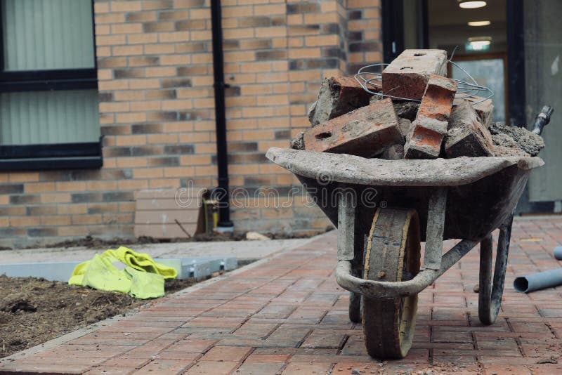 Wheelbarrow at a Construction Site Stock Image - Image of building ...