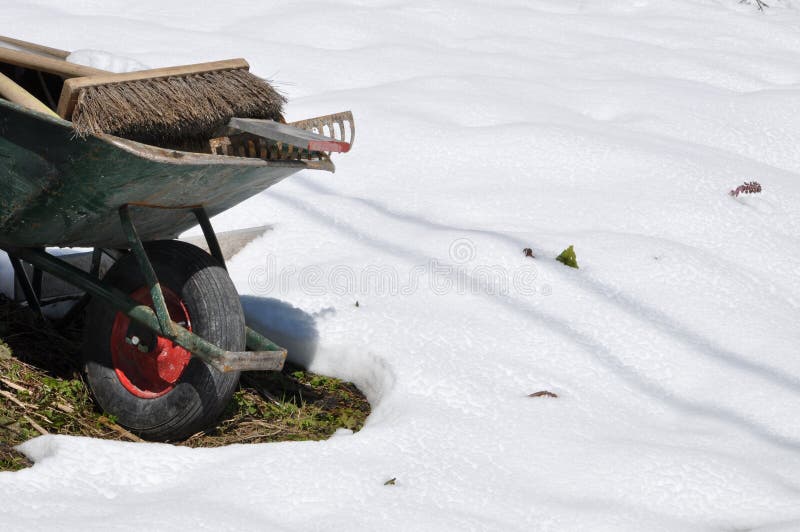 Wheelbarrow with Tools in Snow Stock Photo - Image of wheel, tools ...