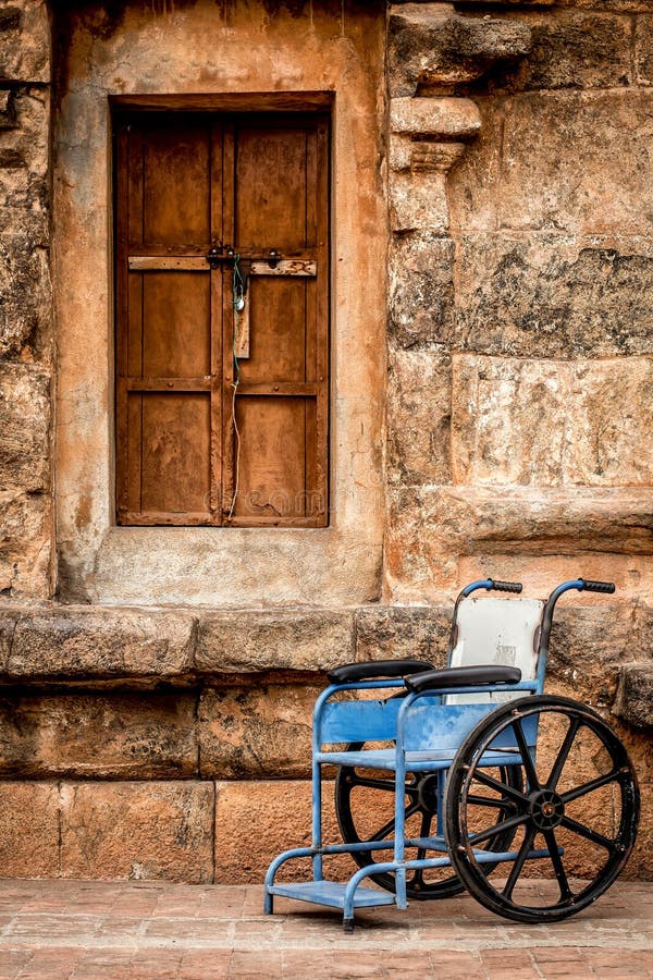 Wheelchair stock image. Image of loss, background, stone - 69243705