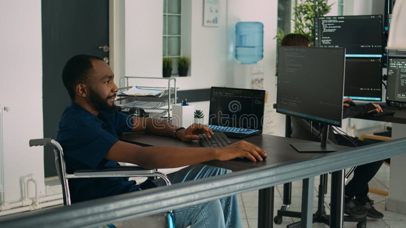 Wheelchair User Software Engineer Working on Server Program with Computer Stock Photo - Image of ...