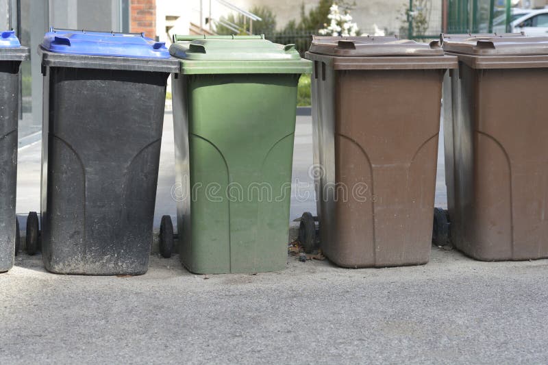 Wheeled garbage bins stock photo. Image of containers - 381811744