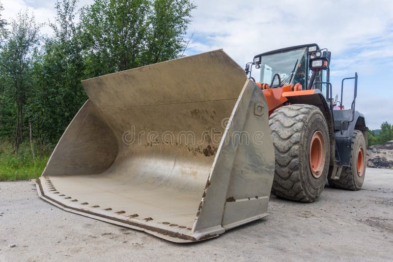 Wheeled Loader with a Large Scoop Stock Photo - Image of snow, blade ...